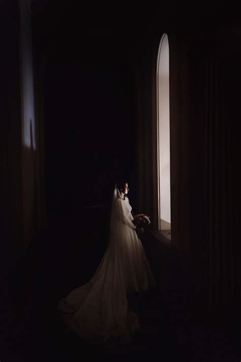 Bride Portrait In Light Of Arched Window Photo By Laura Žygė Photography