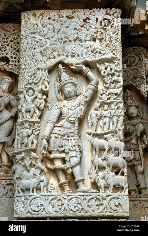 Statue Of Lord Krishna Lifting Govardhan Mountain At Shiva Temple