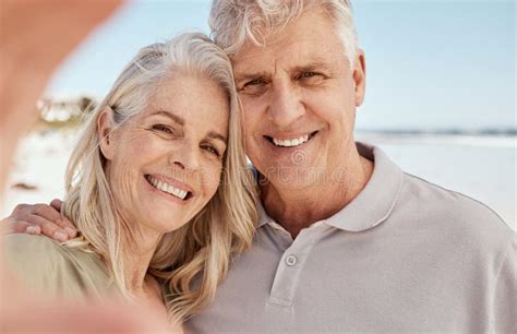 Old Couple Selfie And Smile In Portrait On Beach Love And Travel With