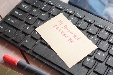 Premium Photo Writing Password On A Sticky Note