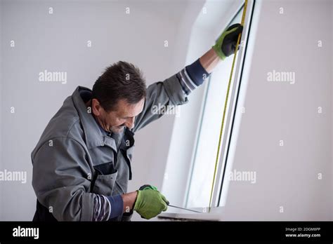 Man Measuring Window Frame Hi Res Stock Photography And Images Alamy