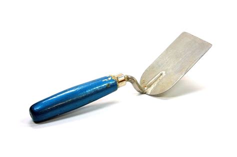 Premium Photo High Angle View Of Metallic Object Against White Background