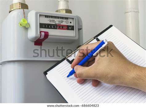 Person Reading Gas Meter Private House Stock Photo Edit Now 686604823