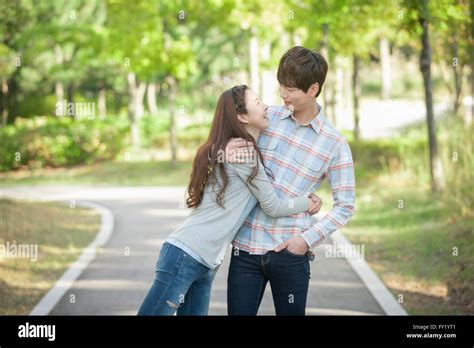 Couple Hugging Each Other At Park Stock Photo Alamy