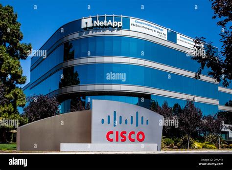 A NetApp Building With A Cisco Sign Placed In Front Created By Combining Two Images After Rumors