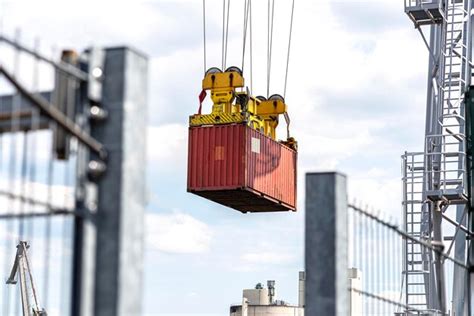 Premium Photo A Container Gantry Crane On A Rail Loads The Container