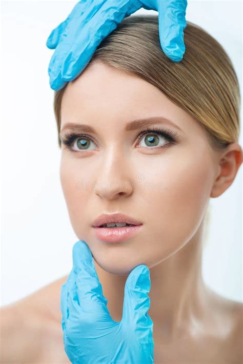 Plastic Surgeon Examining Woman Stock Image Image Of Surgeon Modern