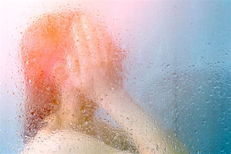 Premium Photo Beautiful Woman In The Shower Behind Glass With Drops