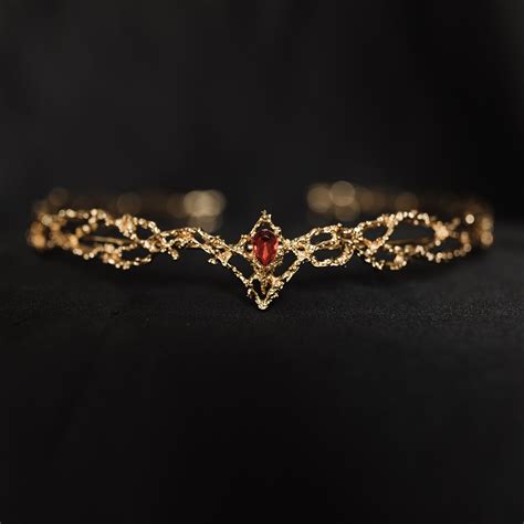 Kings Crown In Gold Color Metal With Red Faux Ruby Color Crystal