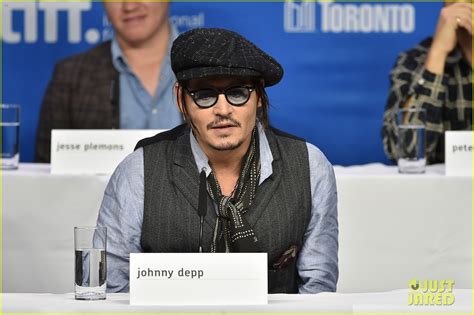 Johnny Depp And Dakota Johnson Step Out For Black Mass Tiff Photo Call