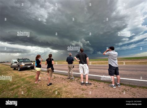 Storm Chasing Tornado Researchers Documenting An Approaching Supercell