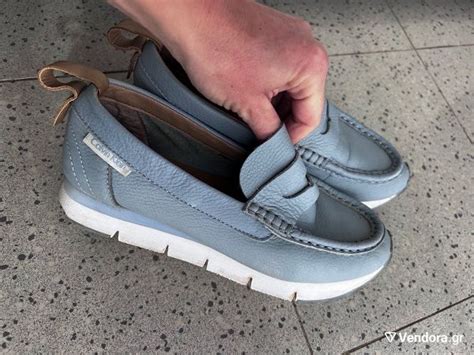 Μοκασίνια γυναικεία δερμάτινα Calvin Klein… € 15 00 Vendora