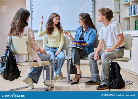 Teamwork Teamwork Of Students Working Together In School Classroom