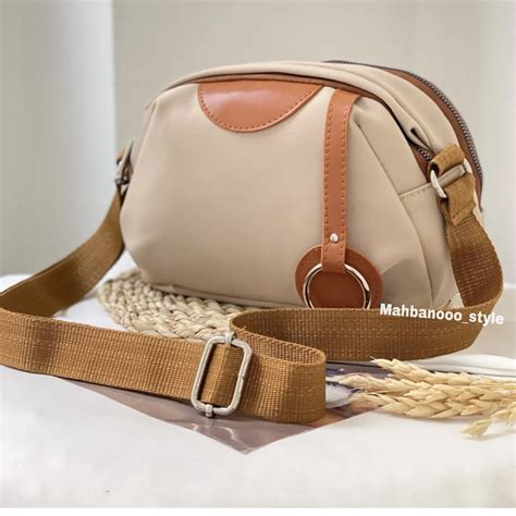 کیف دوشی زنانه مدل فلیکس