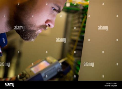 Technician Using Digital Cable Analyzer Stock Photo Alamy