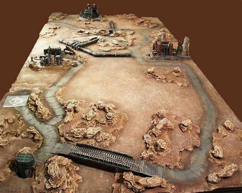A Table That Has Some Sort Of Terrain On It With Buildings And Other