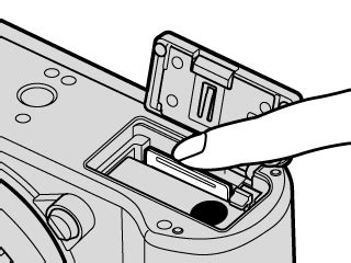 Inserting The Battery And A Memory Card