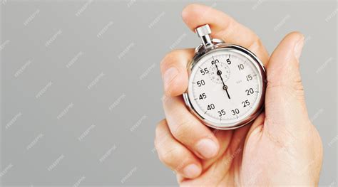Premium Photo Stopwatch In Human Hand Timer