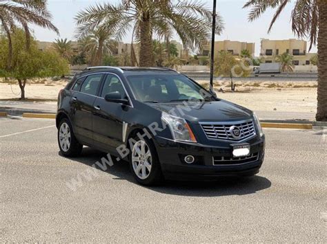 كاديلاك اس ار اكس رمادي 2015 للبيع في البحرين سيل