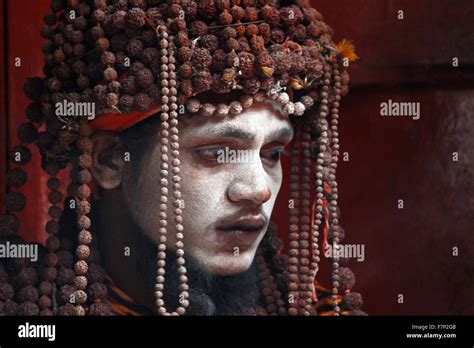 Sadhu With Painted Face And Heavy Beads On Head Kumbh Mela Nasik