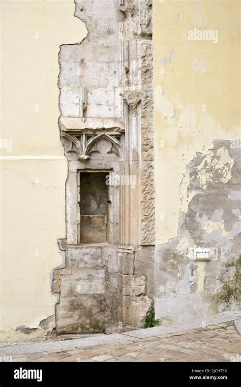 An Old Window In Prague Displaying Its Gothic Roots In Between Fading