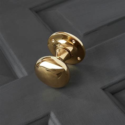Cushion Door Knobs Pair Brass