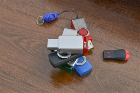 Premium Photo Closeup Of Several Usb Sticks On The Wooden Table Several Different Usb Sticks