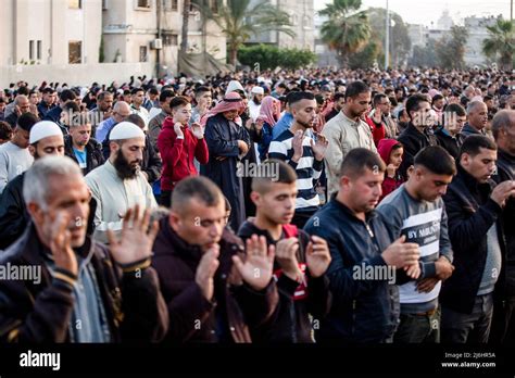 Palestinian Muslims Perform Eid Al Fitr Prayers At Sunrise Marking The