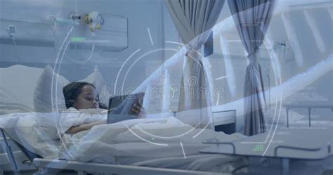 Image Of Data Processing Over Biracial Girl Patient Using Tablet In Hospital Bed Stock Image