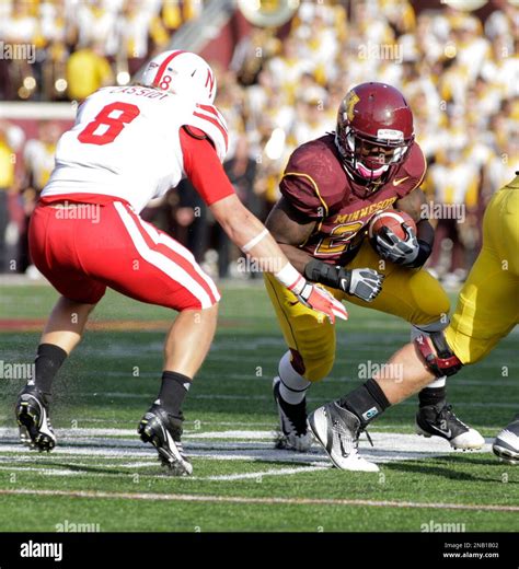 Minnesota Running Back Duane Bennett 22 Runs For Seven Yards Against Nebraska Safety Austin