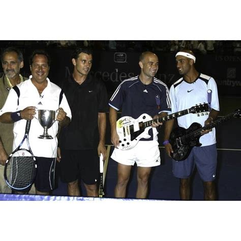Andre Agassi Gavin Rossdale Jon Lovitz And James Blake With A Trophy And Guitars Photo Print