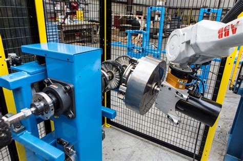 Robotic Lathe And Press Tending Case Study MESH Automation Inc