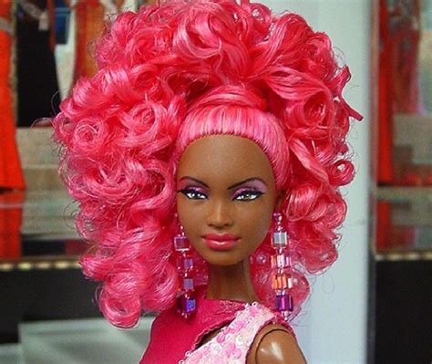 A Barbie Doll With Bright Pink Hair And Earrings