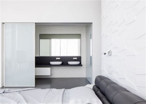 Geometric Panels Create Textured Walls In Apartment By Pitsou Kedem