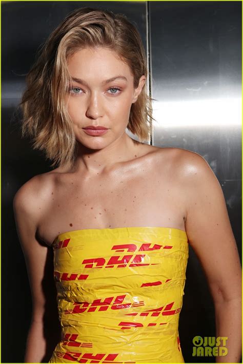 Gigi Hadid Dons Bright Yellow Tape Dress Walks Runway With Travis