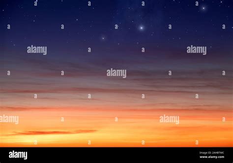 Night Starry Sky At Sunset Blue And Yellow Galaxy Hi Res Stock