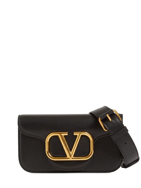 Valentino Garavani Mini Locò Leather Crossbody Bag In Black Modesens