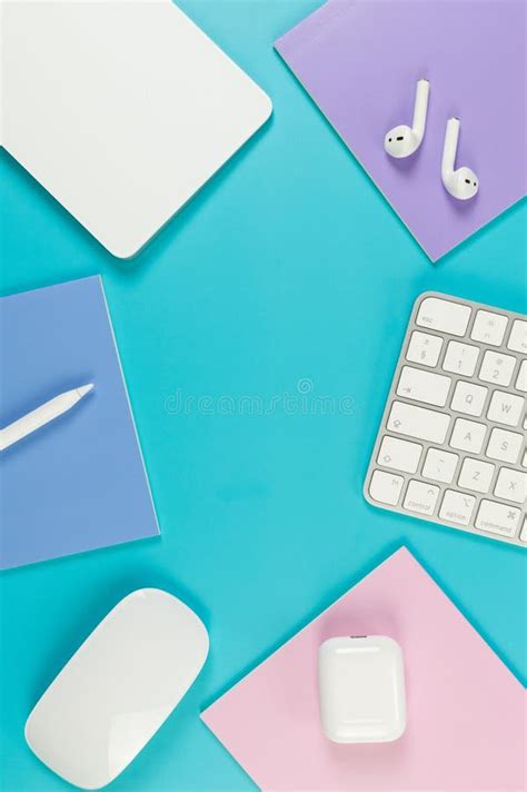 Top View Of White Keyboard Mouse Touchpad Earphones Case Pen On