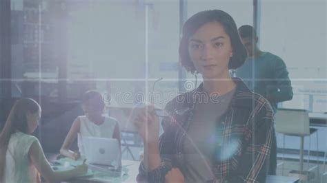 Animation Of Data Processing Against Asian Woman Removing Her Glasses At Office Stock Footage