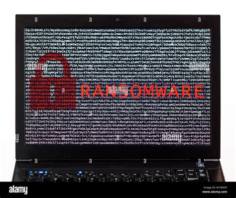 Ransomware Text With Red Lock Over Encrypted Text On A Laptop Screen Against A White Background