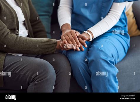 The Support You Need An Unrecognizable Nurse And A Senior Patient