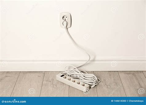 Extension Cord With Power Plug In Socket Indoors Stock Photo Image Of Device Connect 144614300