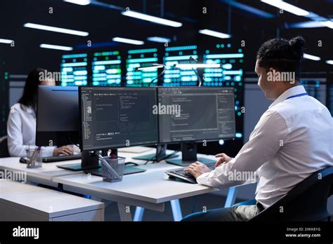 Technicians In Data Center Workspace Running System Diagnostic Tests