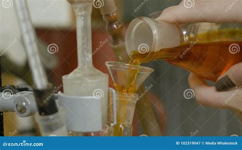 The Chemist Adds Solutions With Precision Ensuring Accurate Neutralization In The Acid Base