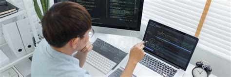 Software Development Concept Male Programmer Pointing On Laptop Screen To Checking Data Codes