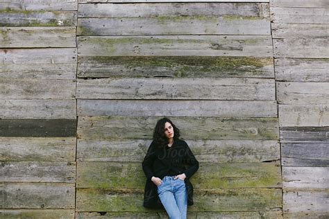 Woman In Front Of A Wooden Wall By Stocksy Contributor Marija Kovac