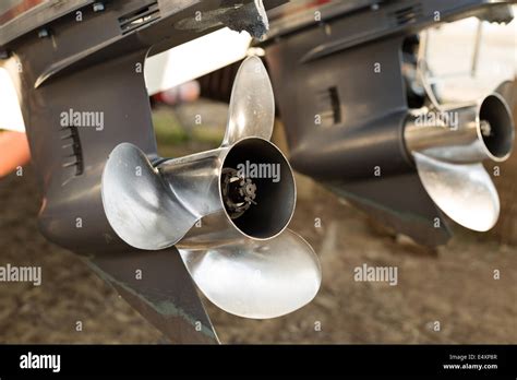 Two outboard boat motors Stock Photo - Alamy