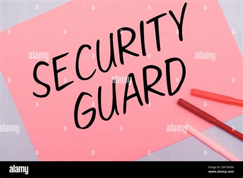 Text Sign Showing Security Guard Word Written On Tools Used To Manage