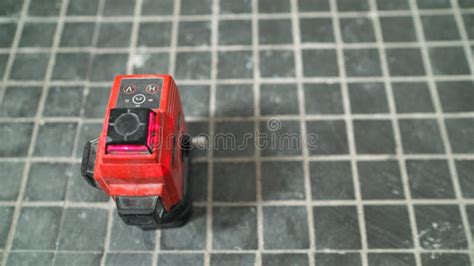 Setting The Laser Level Ceramic Tiles And Tiler Tools Worker Hand