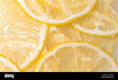 Lemon Thin Slices Filling The Entire Space Stacked On Top Of Each